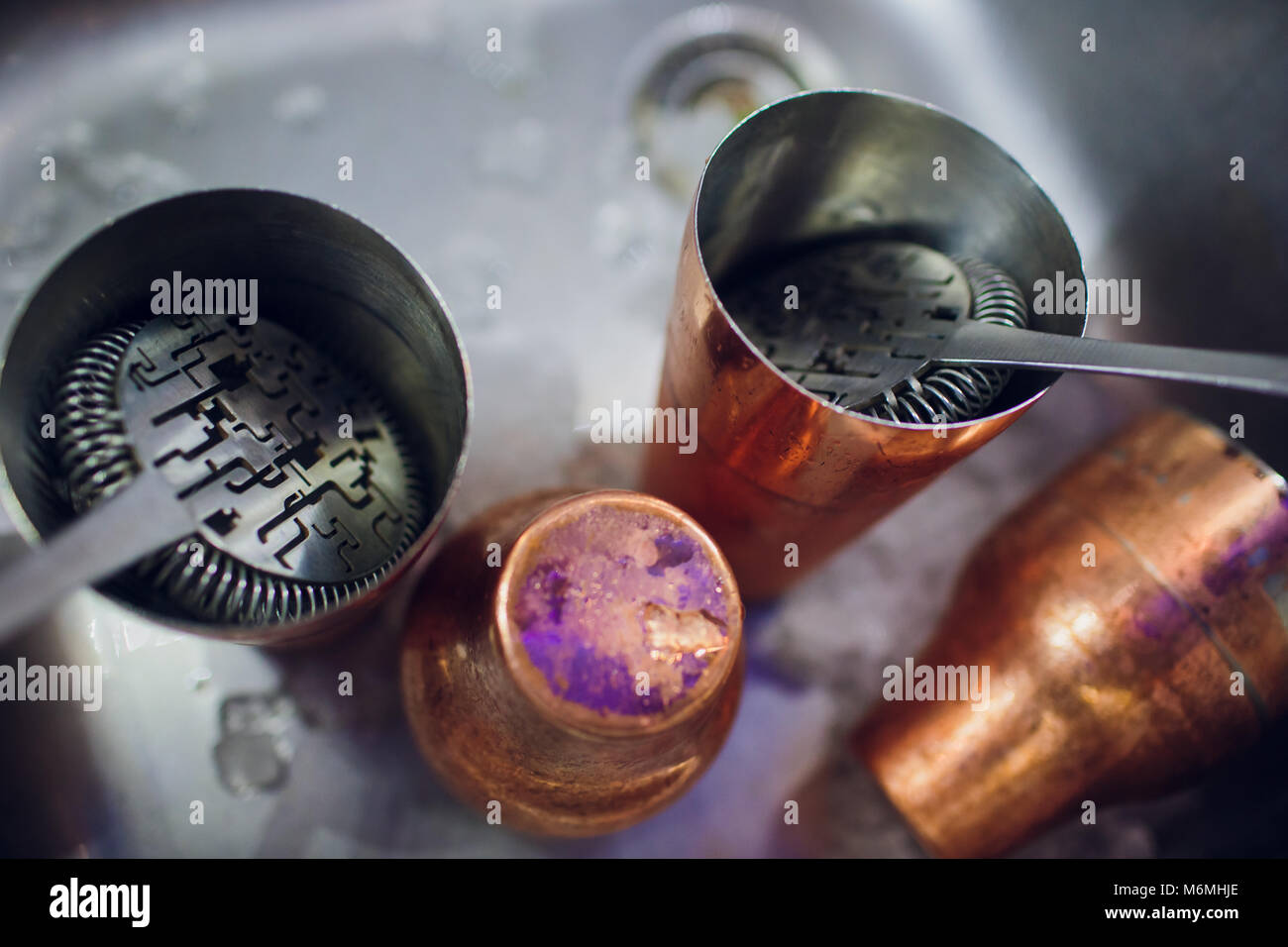 Cocktail, swizzle, the shaker lies in the sink Stock Photo - Alamy