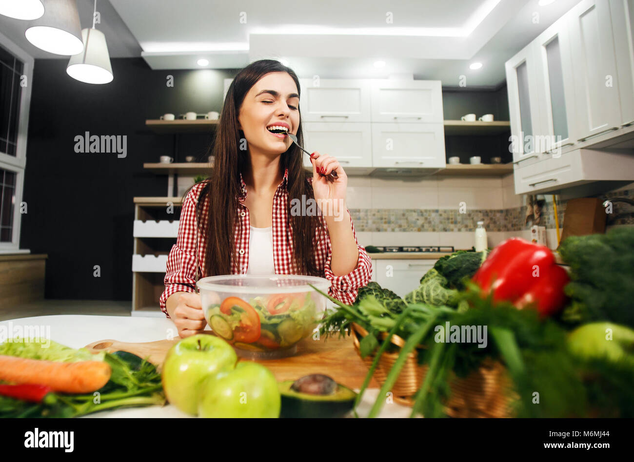 Girl Enjoys Healthy Mixed Salad Stock Photo - Alamy