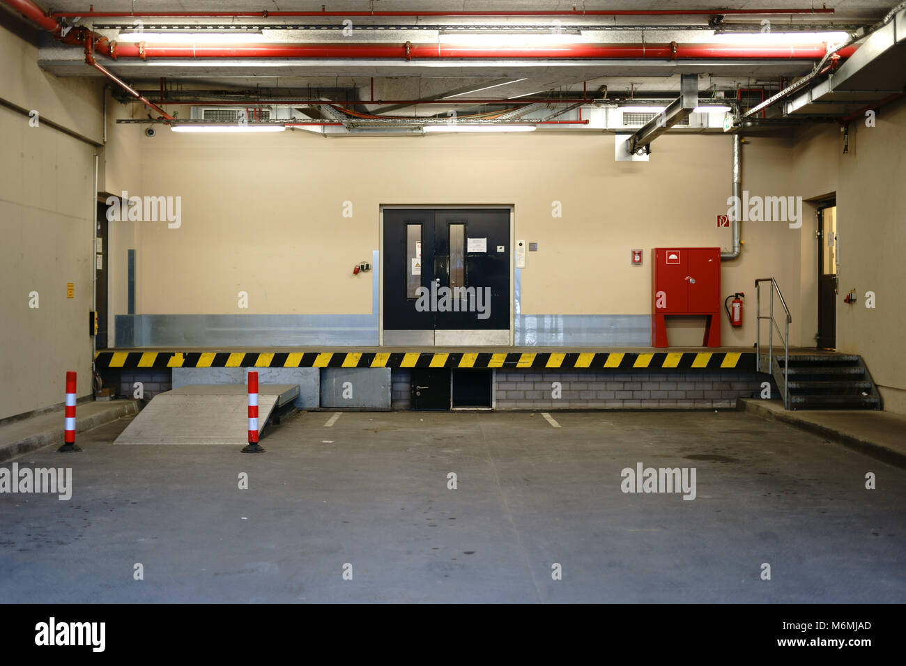 The loading ramp of a business building with fire safety equipment ...