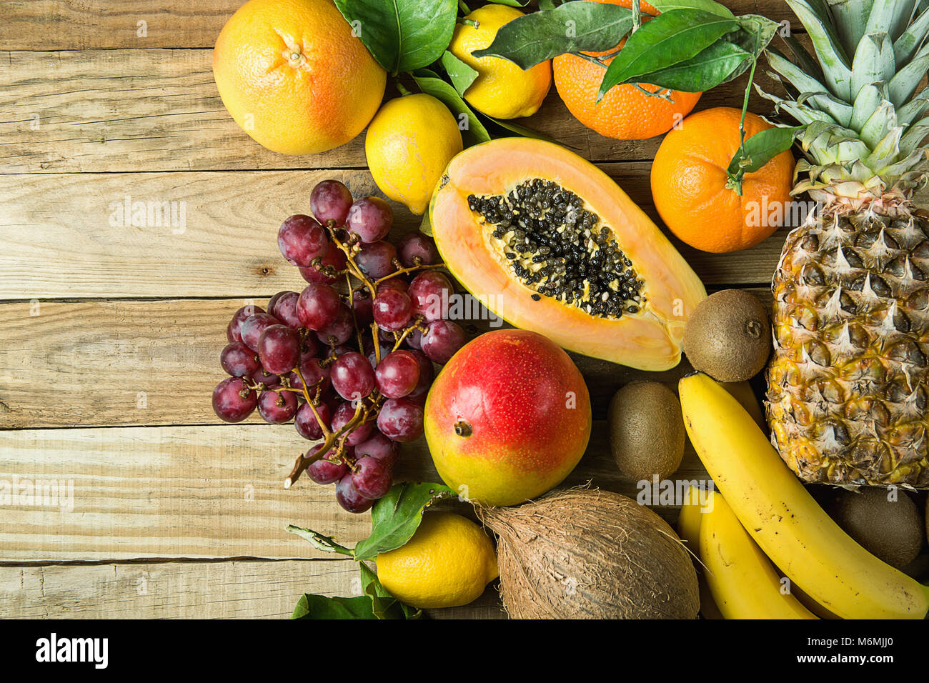 Side Border with Copy Space from Fresh Tropical Fruits Pineapple Papaya ...
