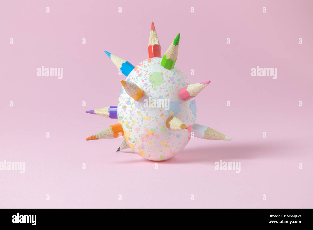 White egg with thorns made of colorful pencils with watercolor ...