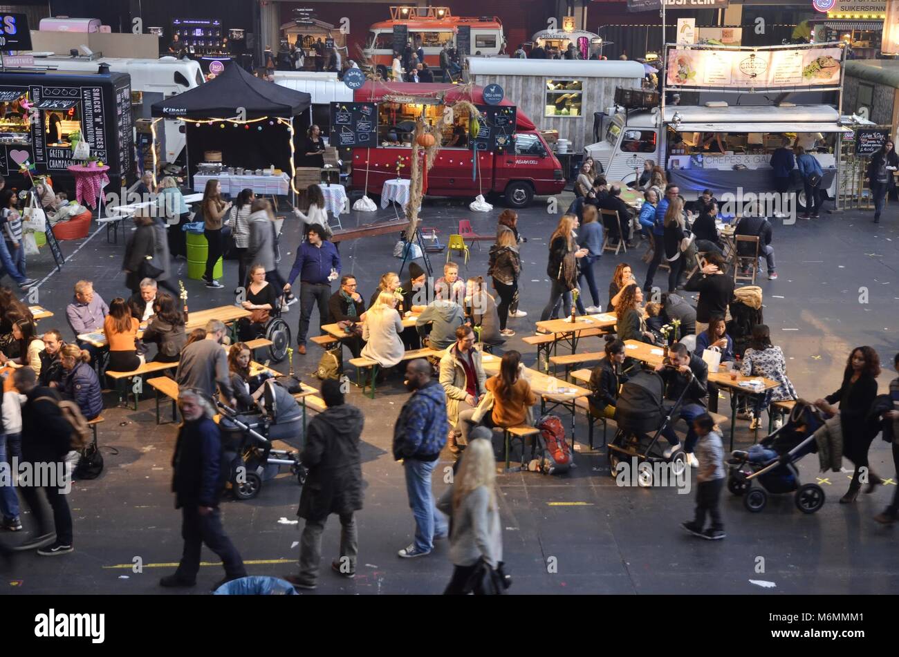 Visitors at the Crepesmobiel, the Deli Lama and the Scropp food trucks ...