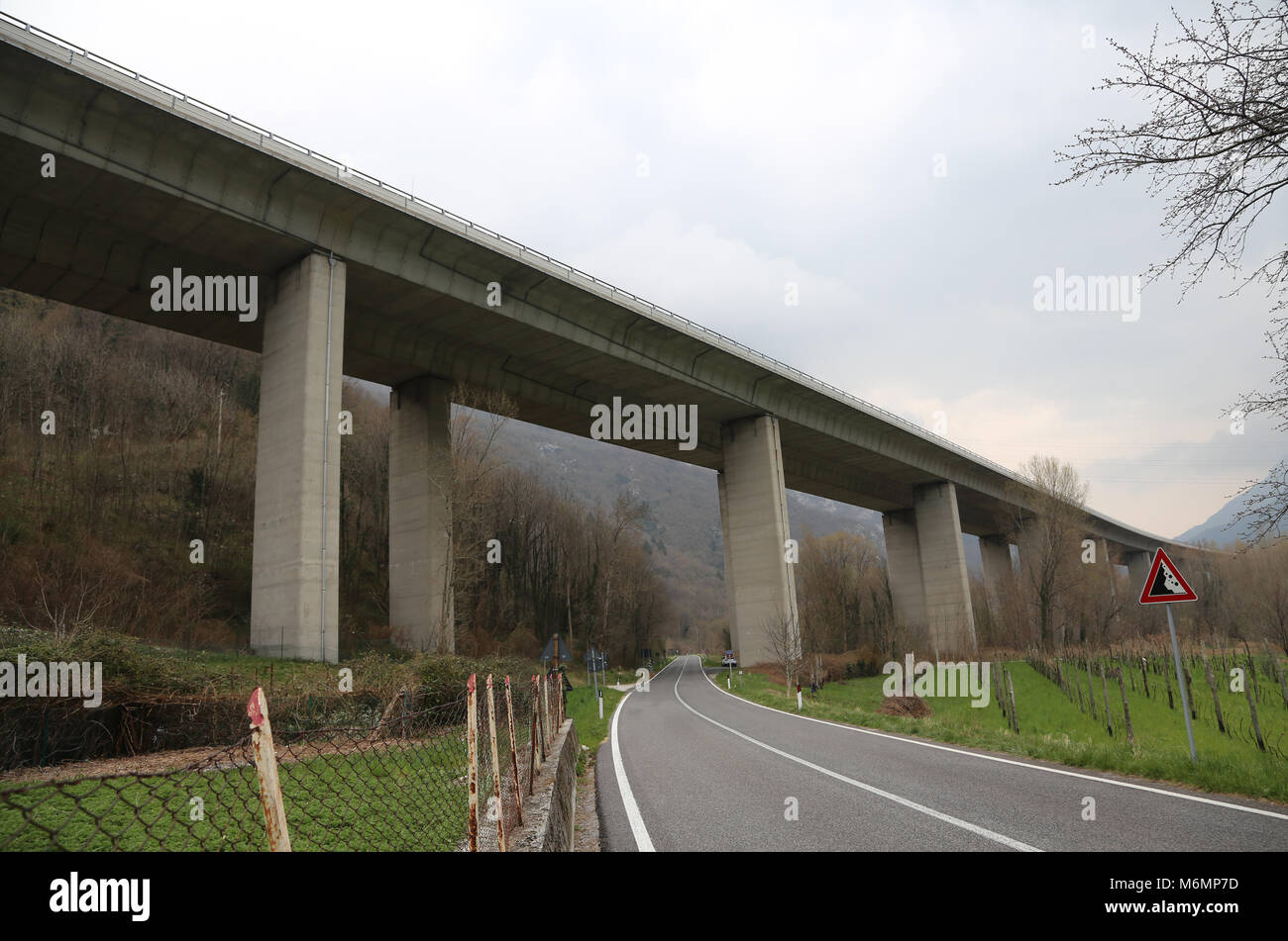 huge elevated highway over the gigantic reinforced concrete pylons ...