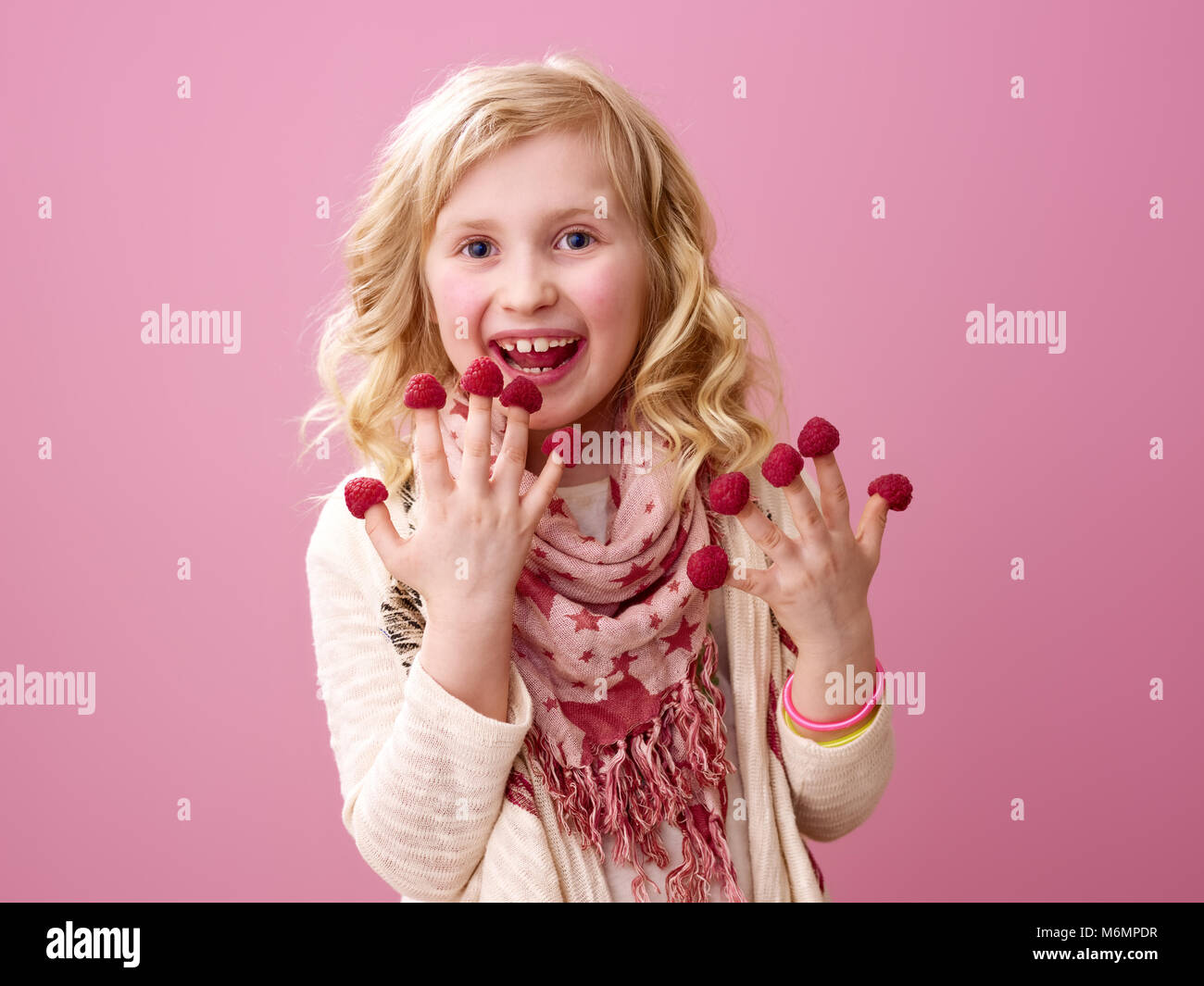 Pink mood. smiling stylish girl with wavy blonde hair on pink ...