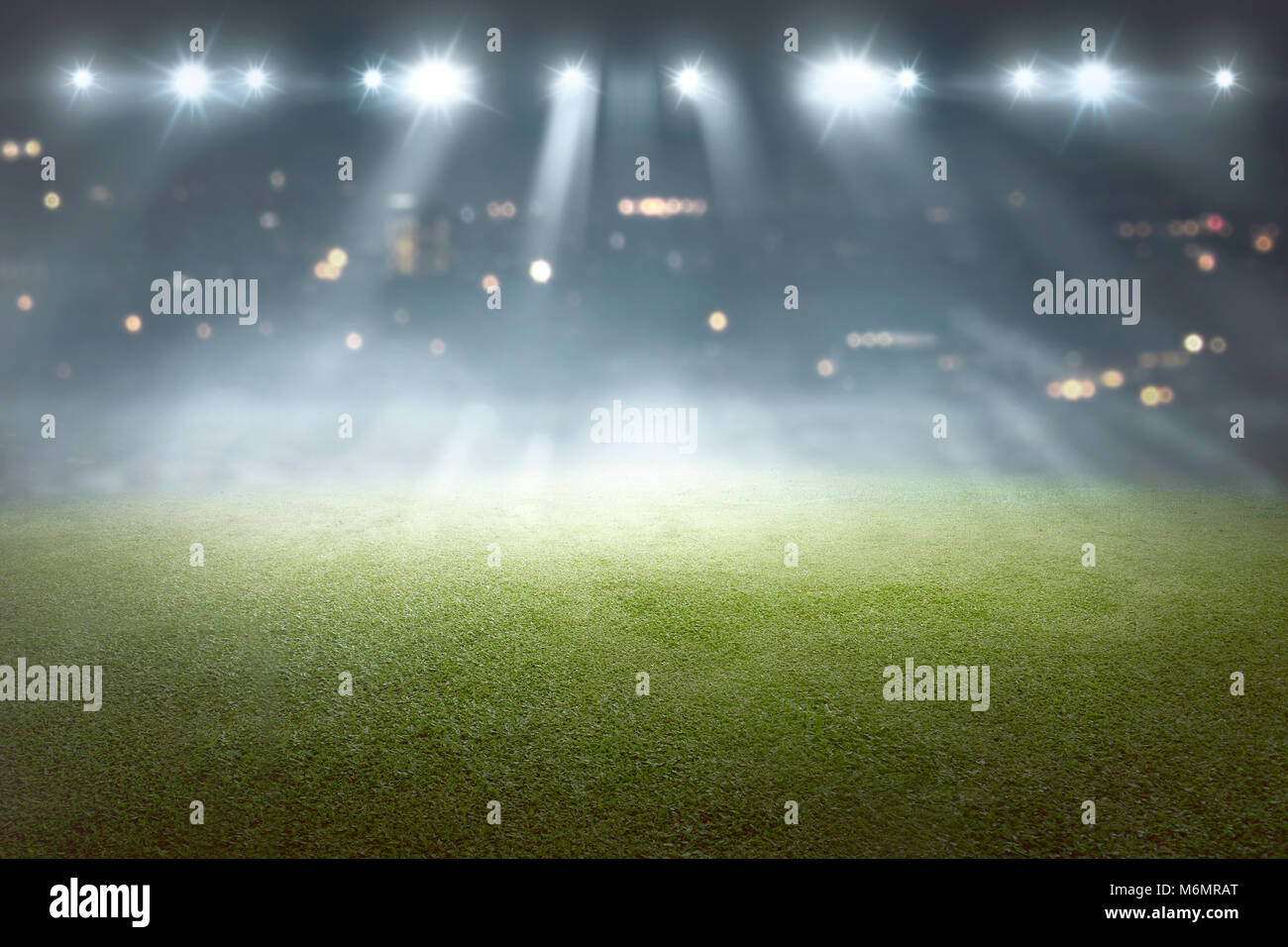 Soccer field with blur spotlight. Soccer stadium Stock Photo - Alamy
