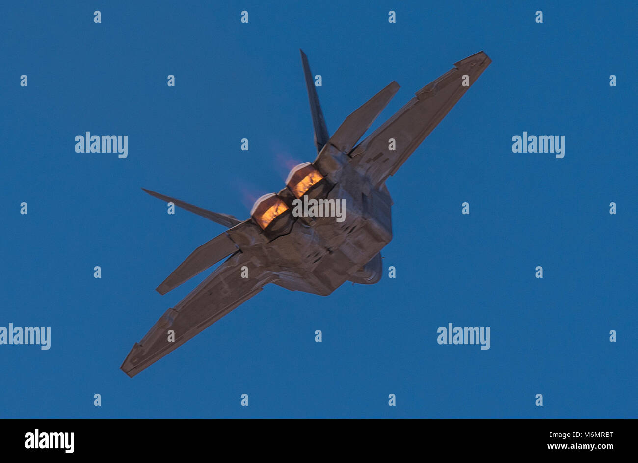 A U.S. Air Force F-22 Raptor performs aerial maneuvers during the ...