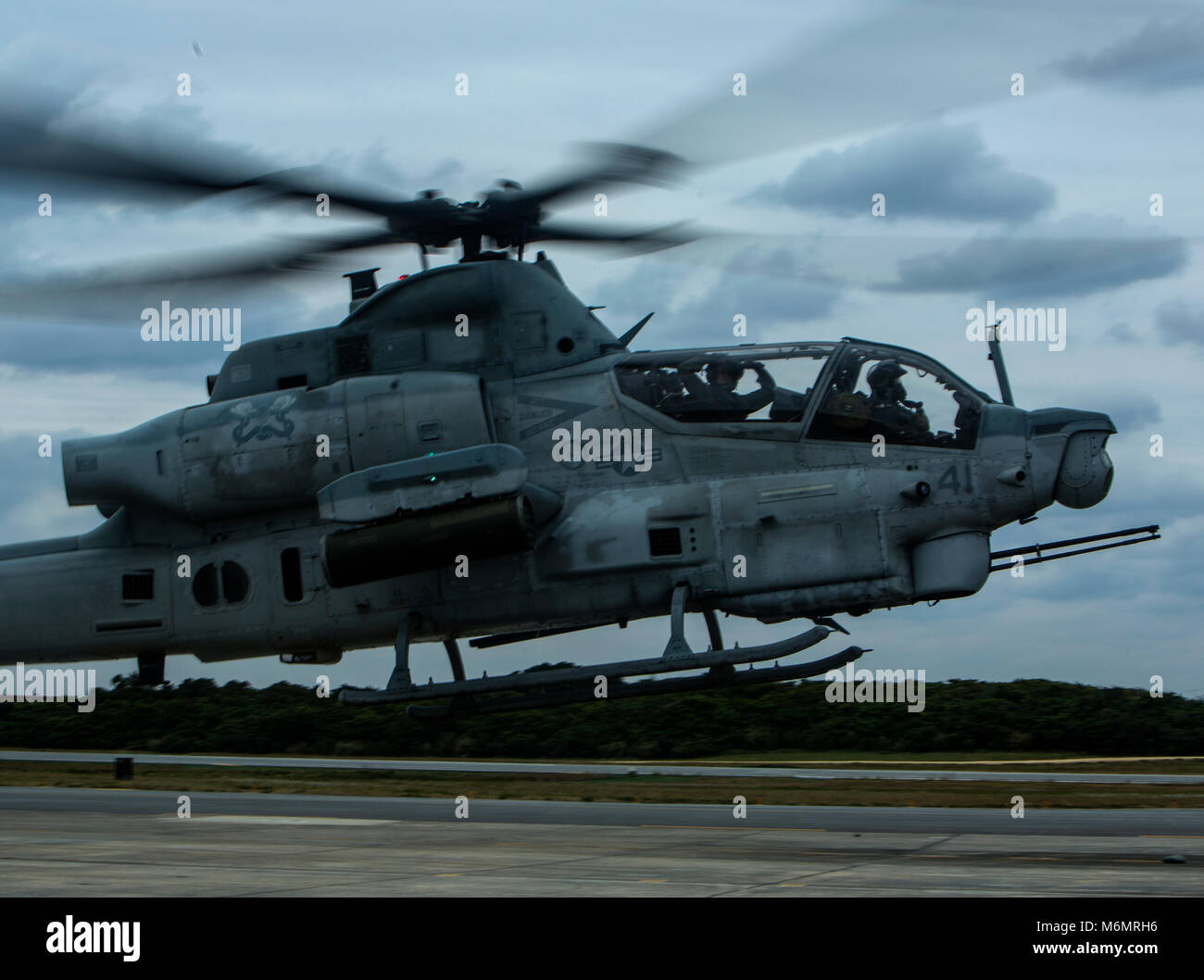 Capt. Justin P. Morrison and Capt. Kyle T. Myer takes off in an AH-1Z ...