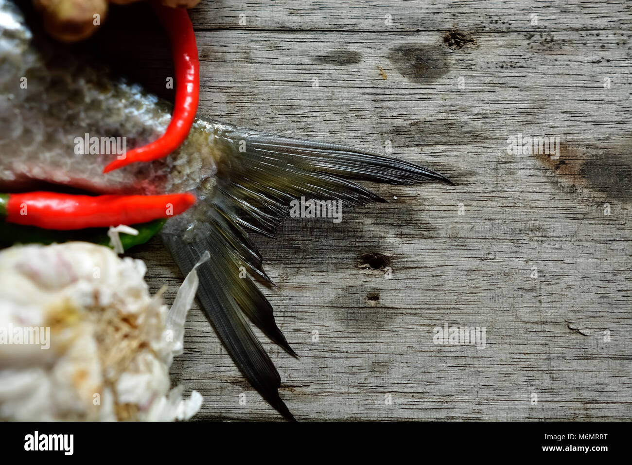 Raw freshest fish with cooking mineral on rough stone background Stock ...
