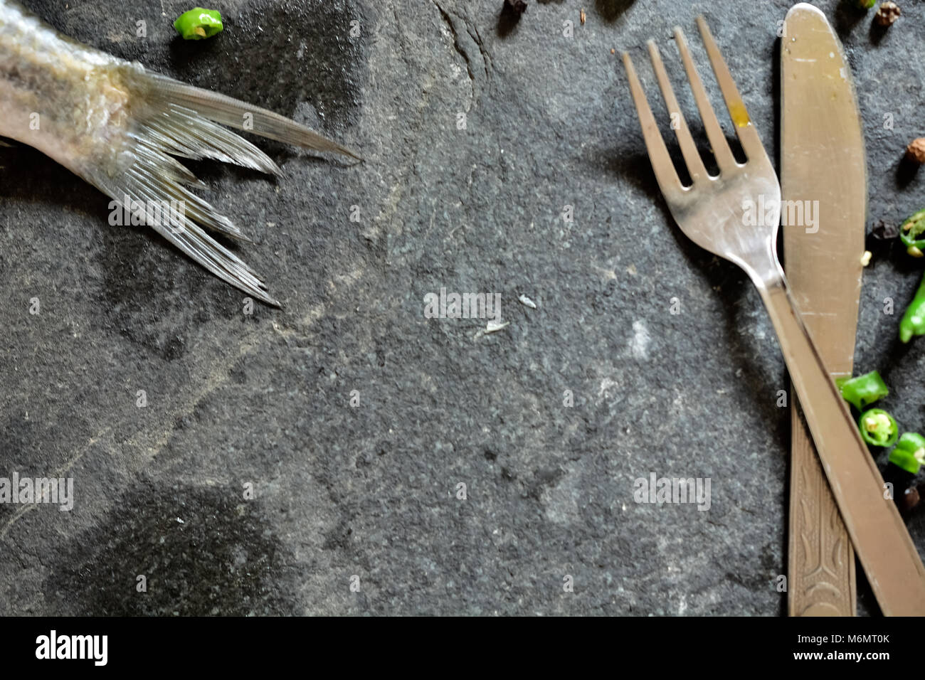 Raw freshest fish with cooking mineral on rough stone background Stock ...