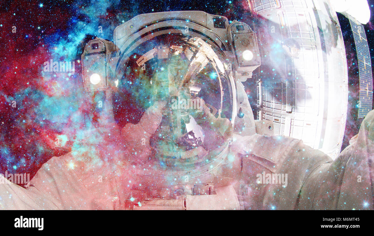 Astronaut in outer space. Science fiction art. Elements of this image ...