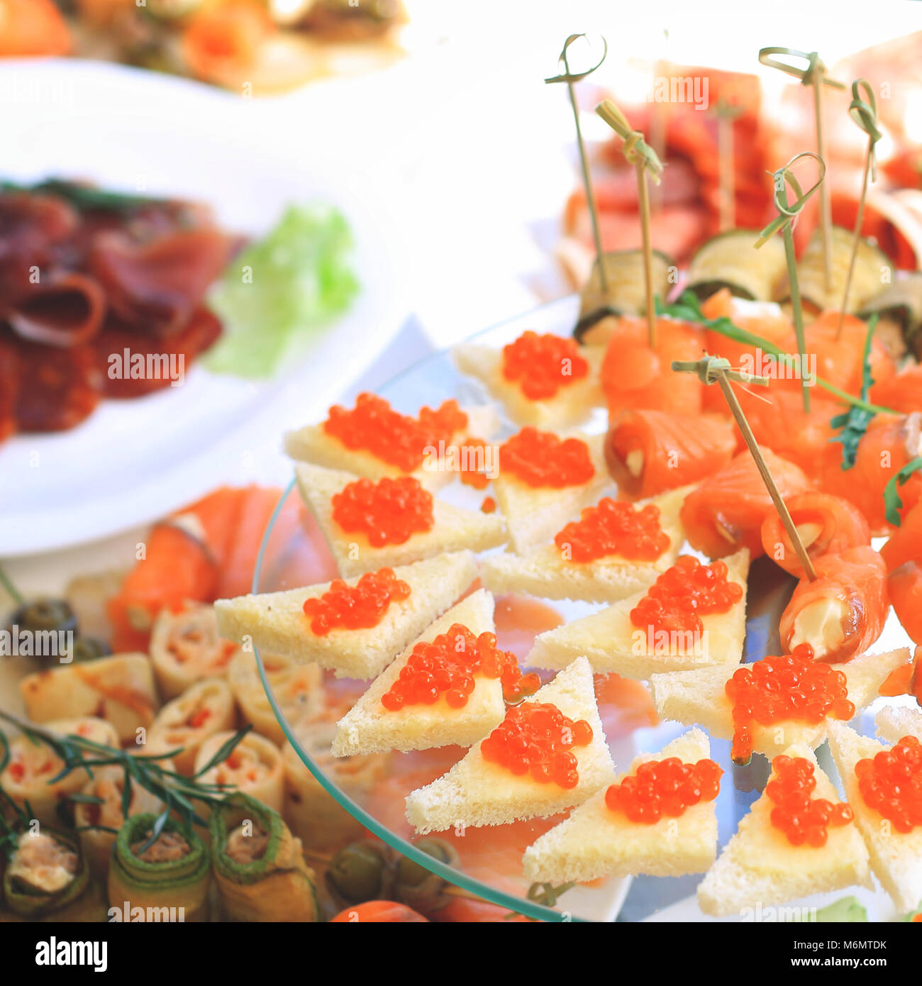 catering table set service with silverware Stock Photo - Alamy