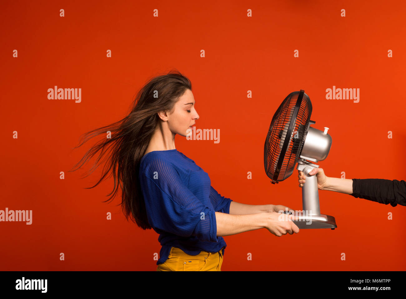 Young woman holding a fan young woman holding a fan hi-res stock ...