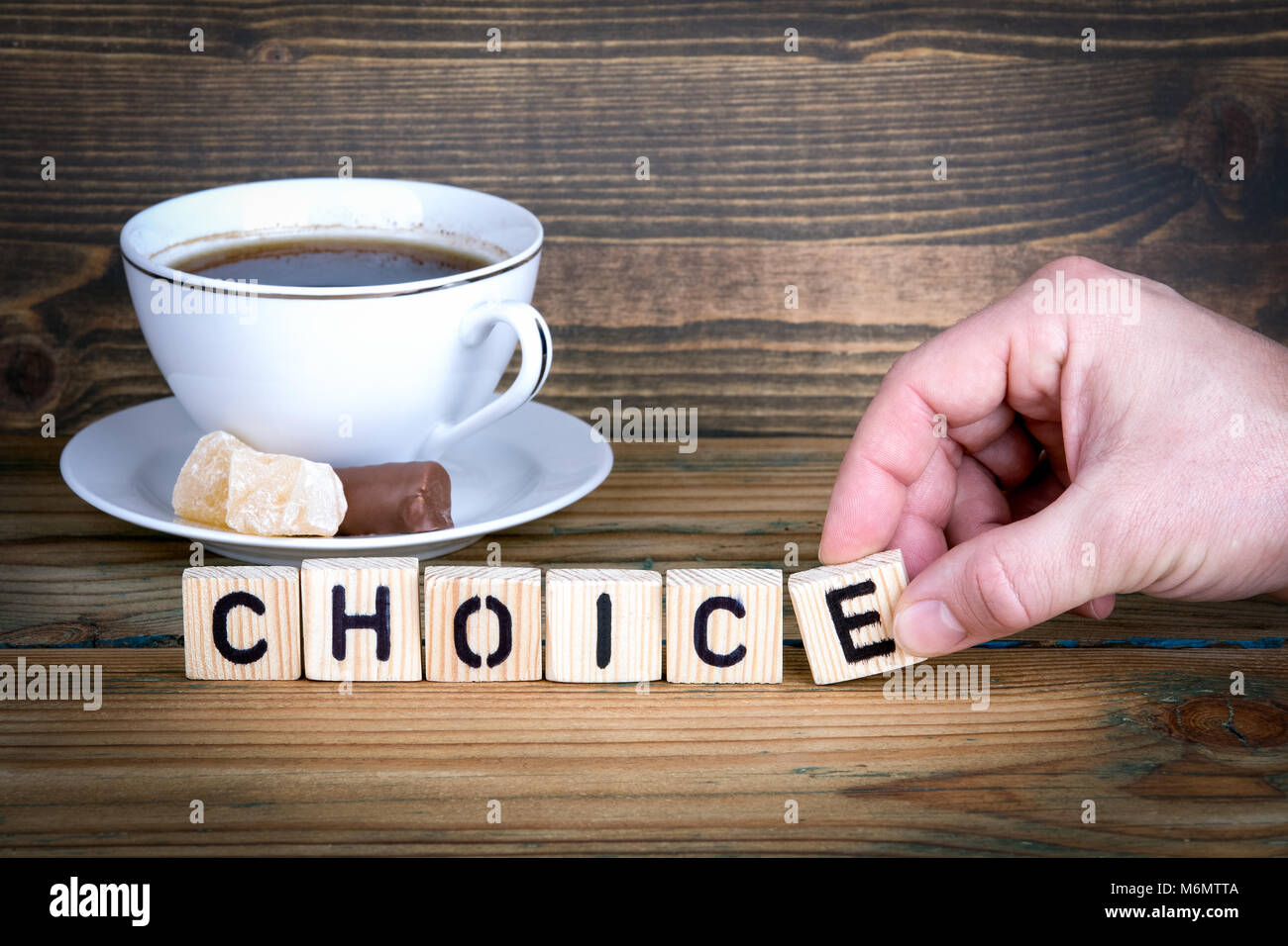 choice. Wooden letters on the office desk, informative and ...