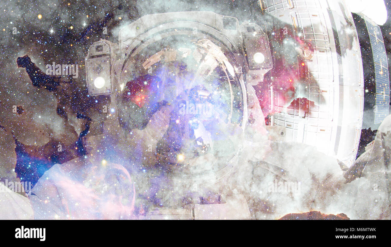 Astronaut in outer space. Science fiction art. Elements of this image ...