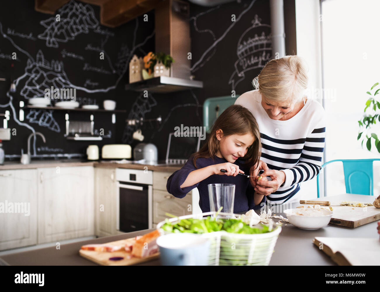 Grandmother cooking vegetables hi-res stock photography and images - Alamy