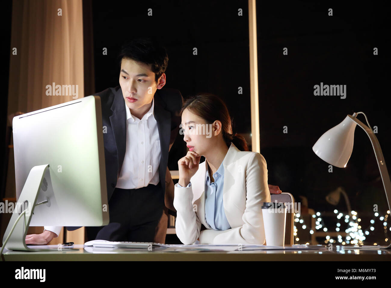 Young business people - Group of business people working overtime in ...