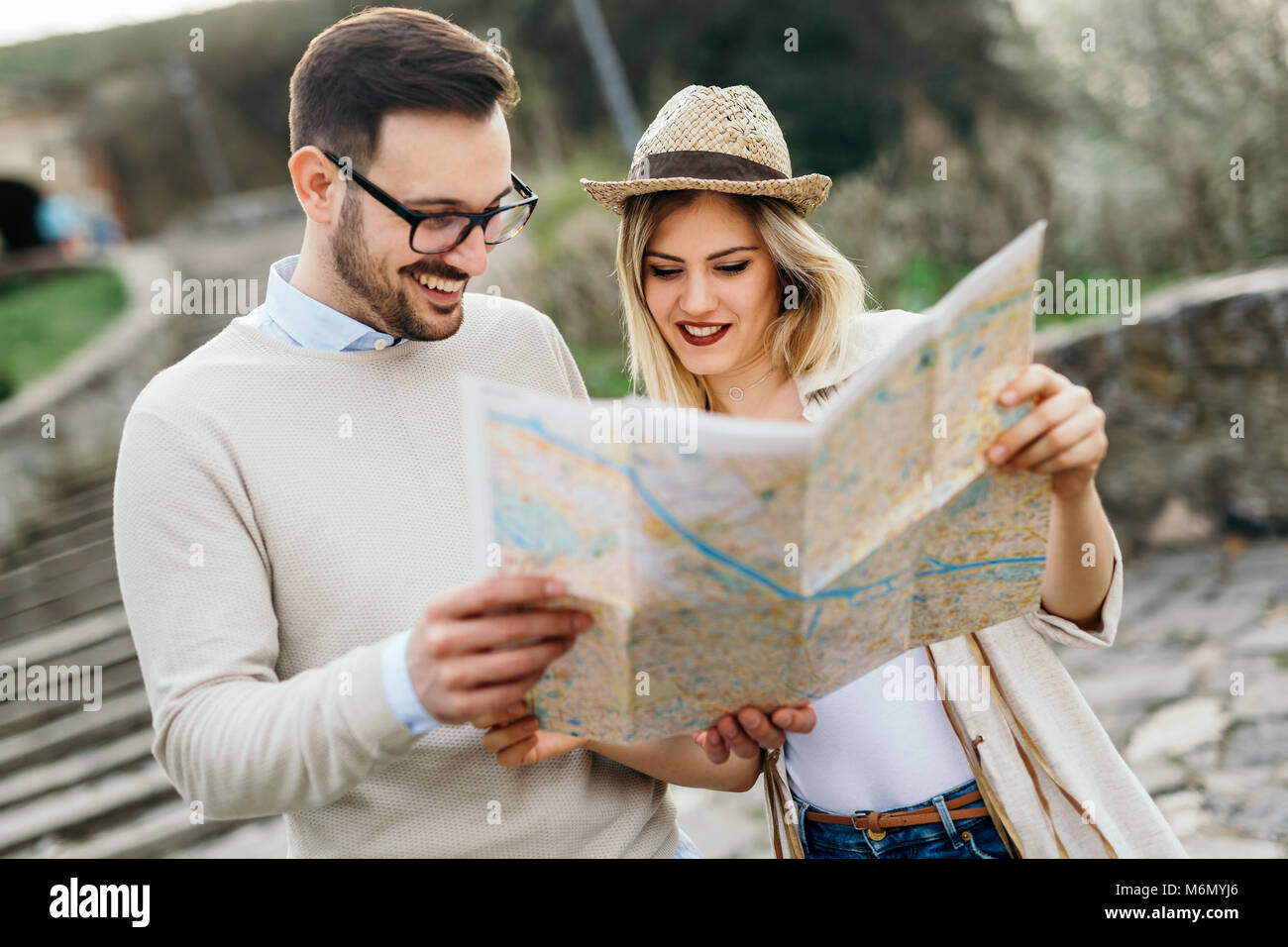 Beautiful couple traveling and sightseeing Stock Photo - Alamy