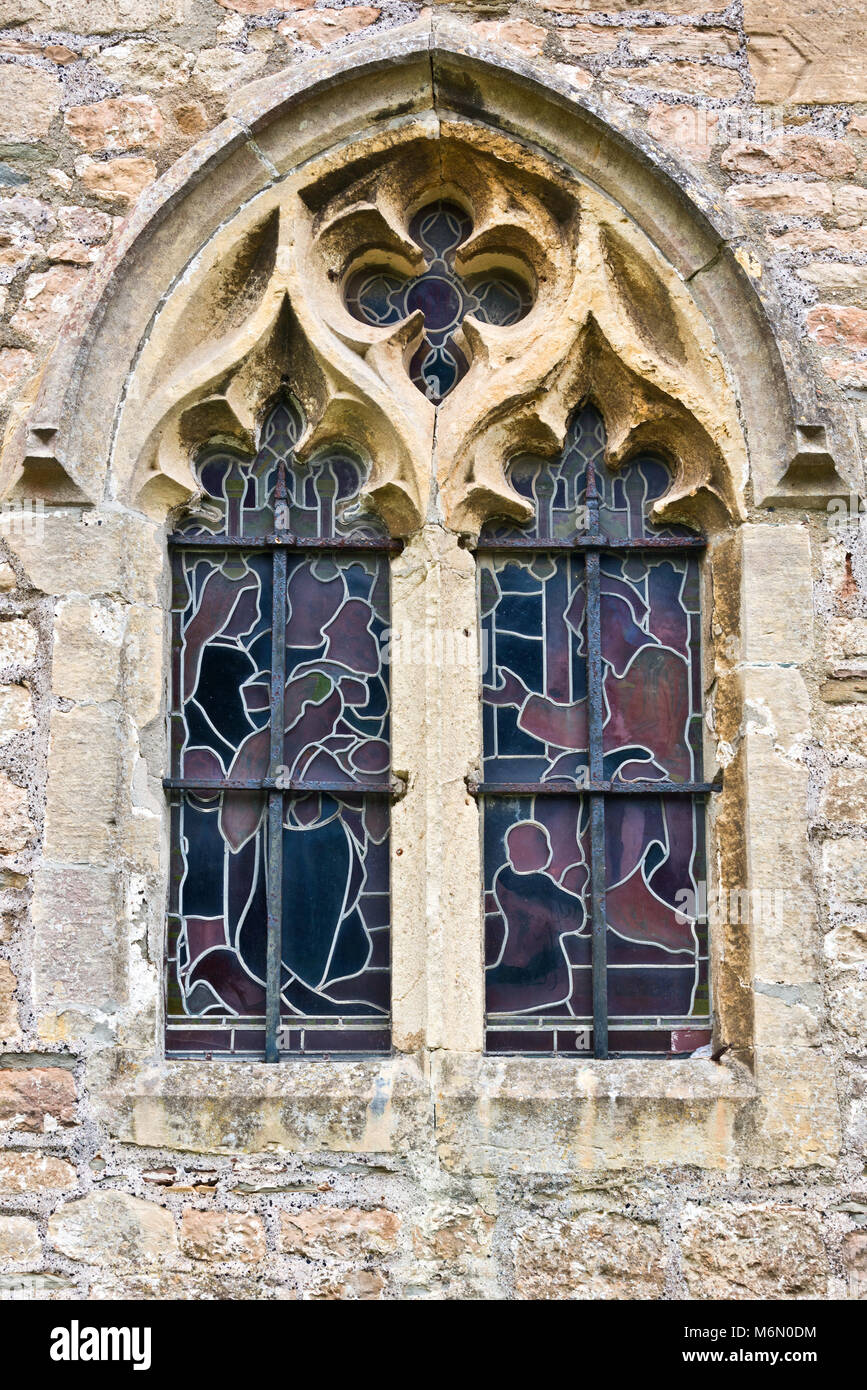An exterior picture of an old stained glass window and Hamstone ...