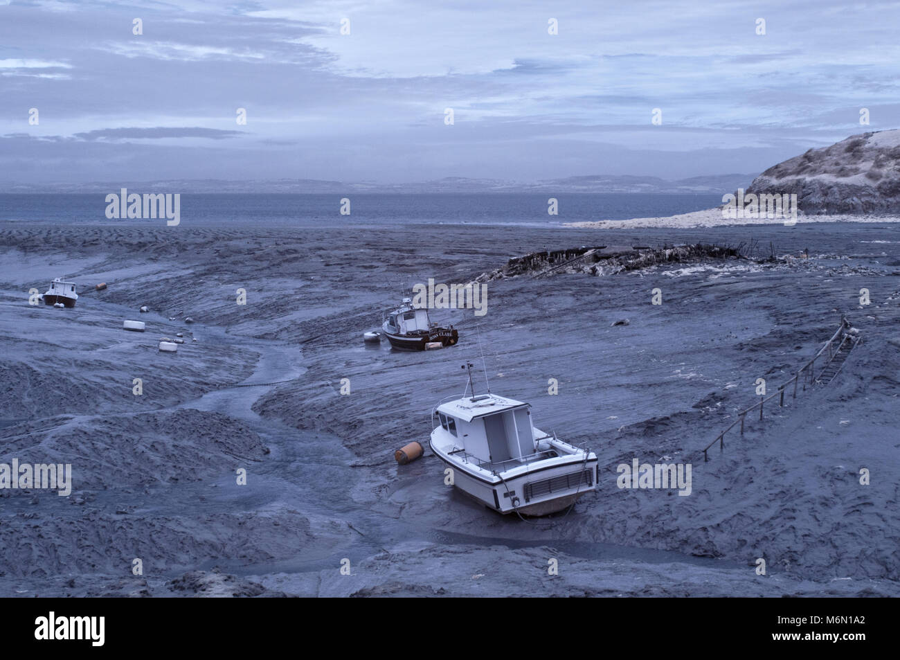 Infrared picture of boats high and dry on the edges of the creeks at ...