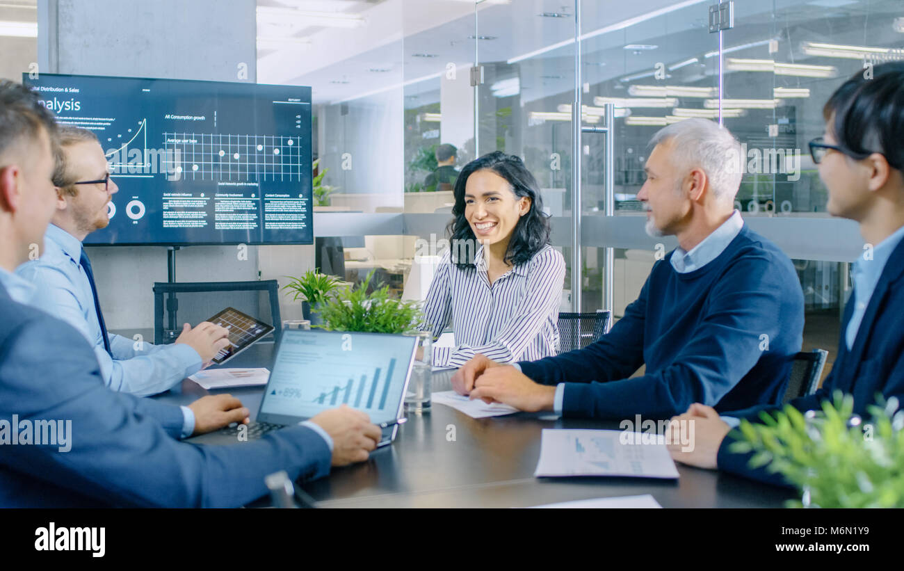 Diverse Team of Executives Have Meeting in a Conference Room. They ...