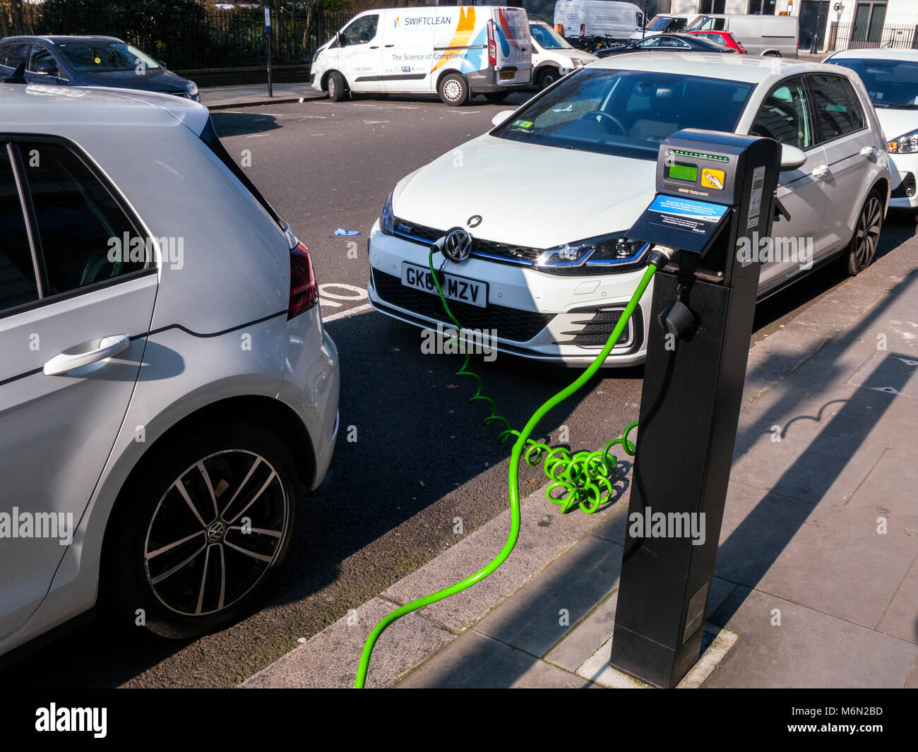Electric Car being charged at street chargepoint, London Stock Photo ...