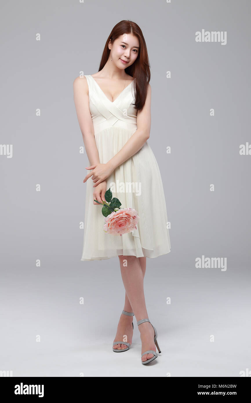 Beauty stylish asian women posing in fashionable clothes isolated White ...