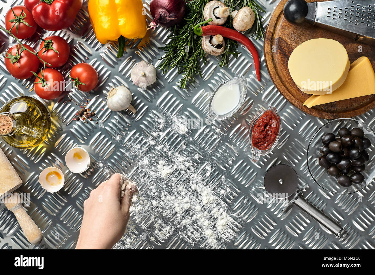 Young woman cooking in kitchen, closeup Stock Photo - Alamy