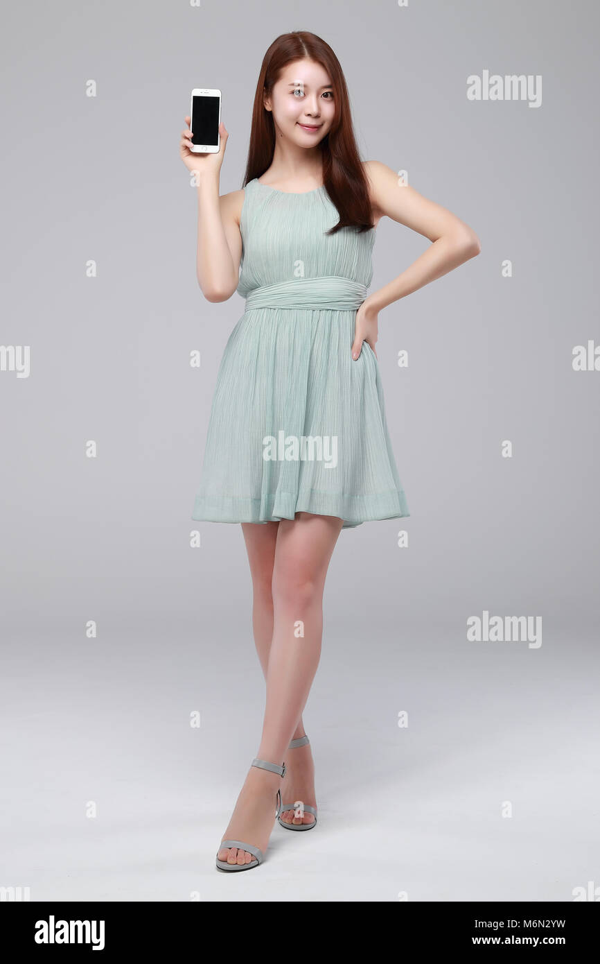 Beauty stylish asian women posing in fashionable clothes isolated White ...