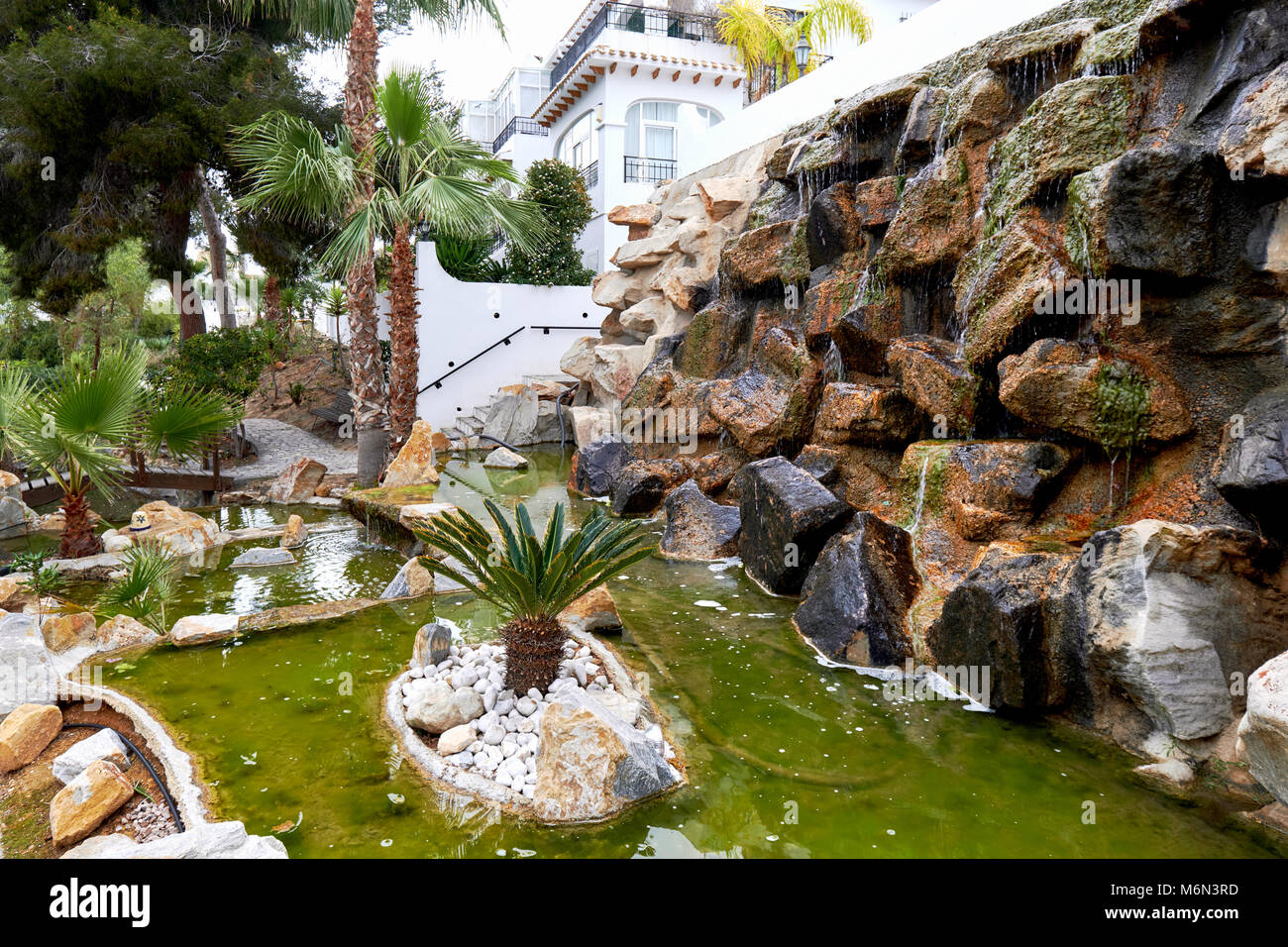 Decorative waterfall outdoors Stock Photo - Alamy
