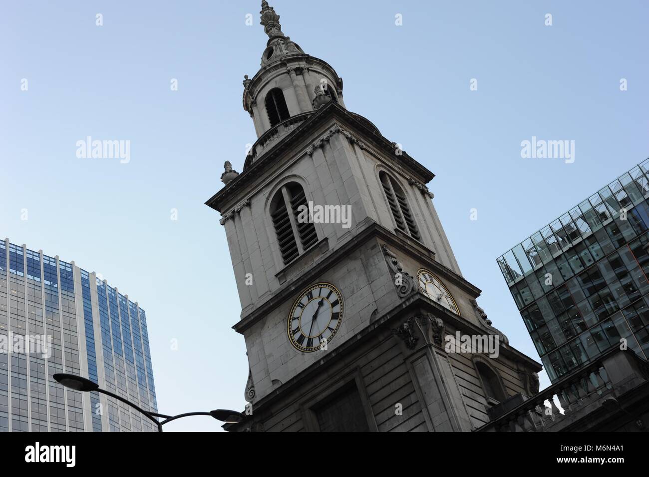 Clocks on building exterior Stock Photo - Alamy
