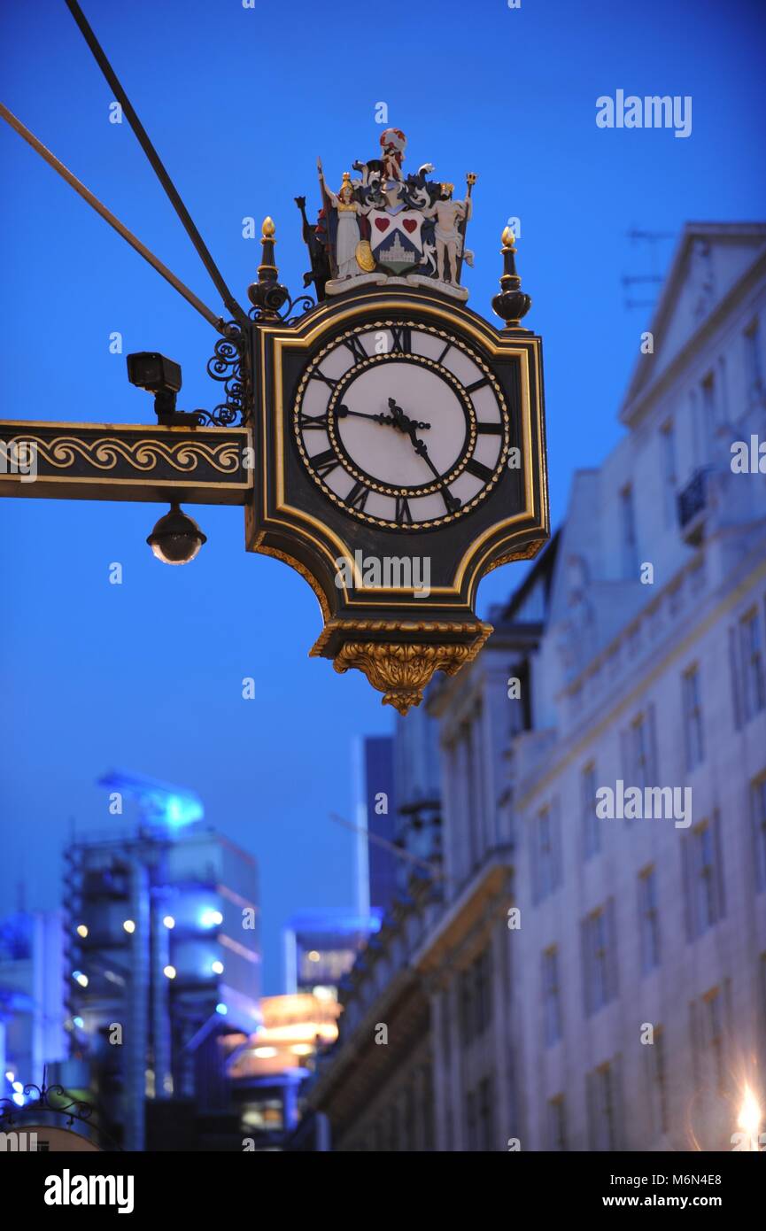 Clocks on building exterior Stock Photo - Alamy