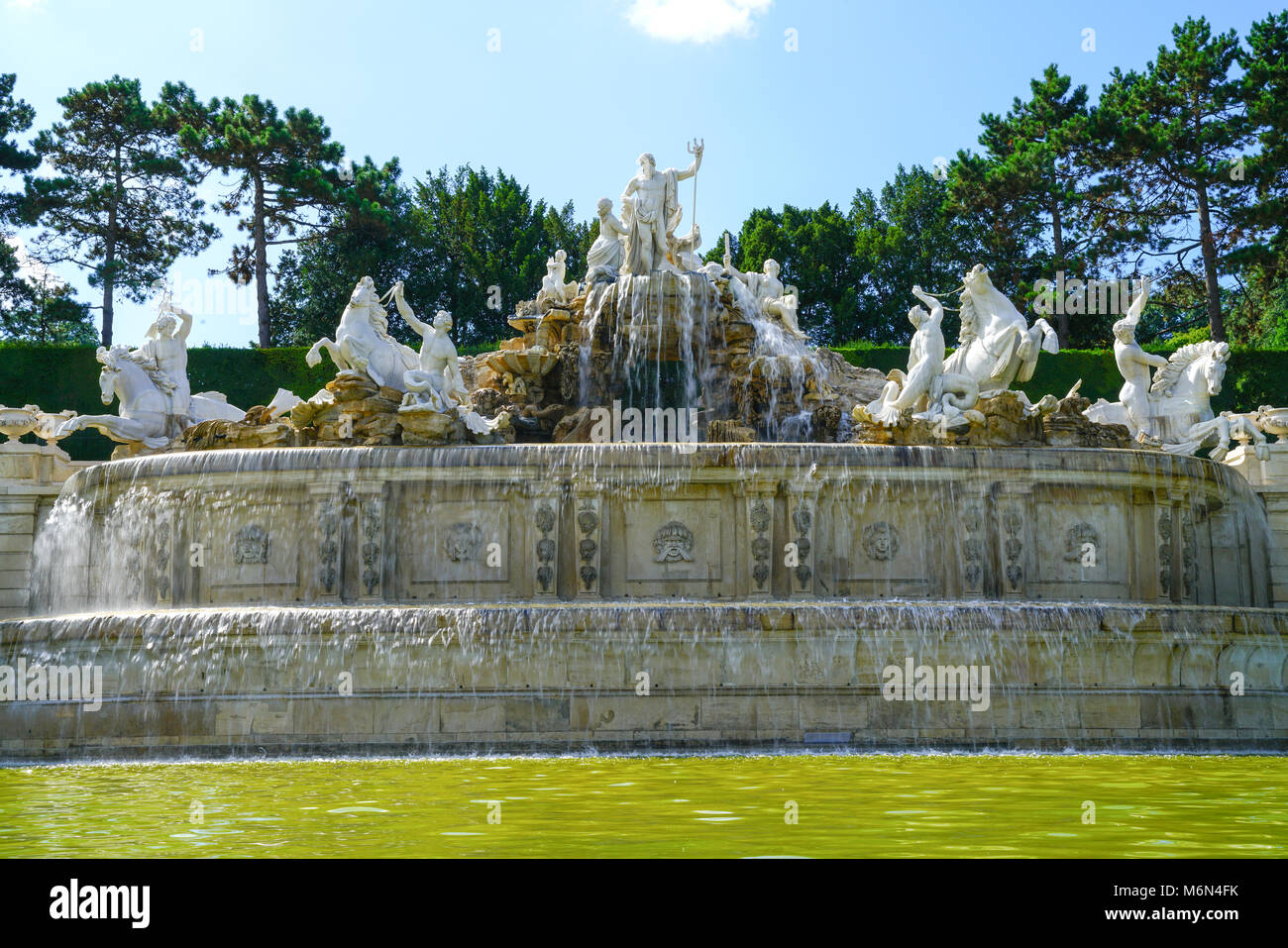 VIENNA,AUSTRIA - SEPTEMBER 4 2017; large water featurewhite statues and ...