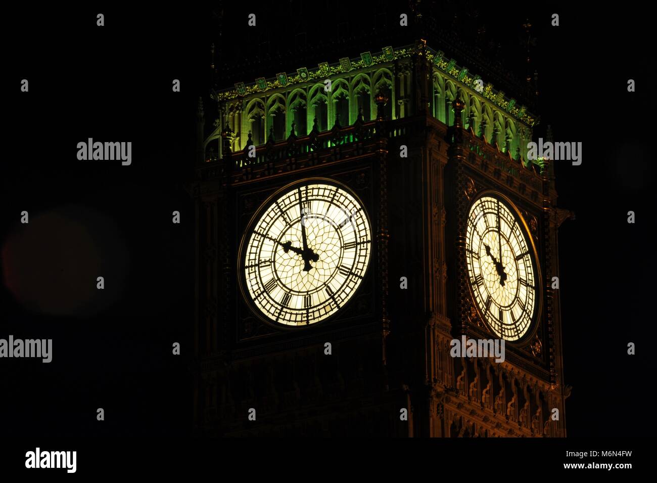 Clocks on building exterior Stock Photo - Alamy