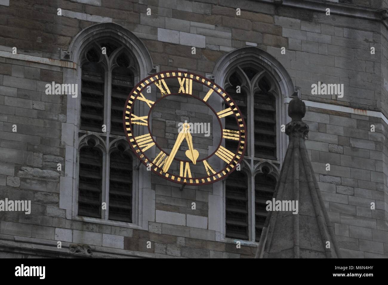 Clocks on building exterior Stock Photo - Alamy