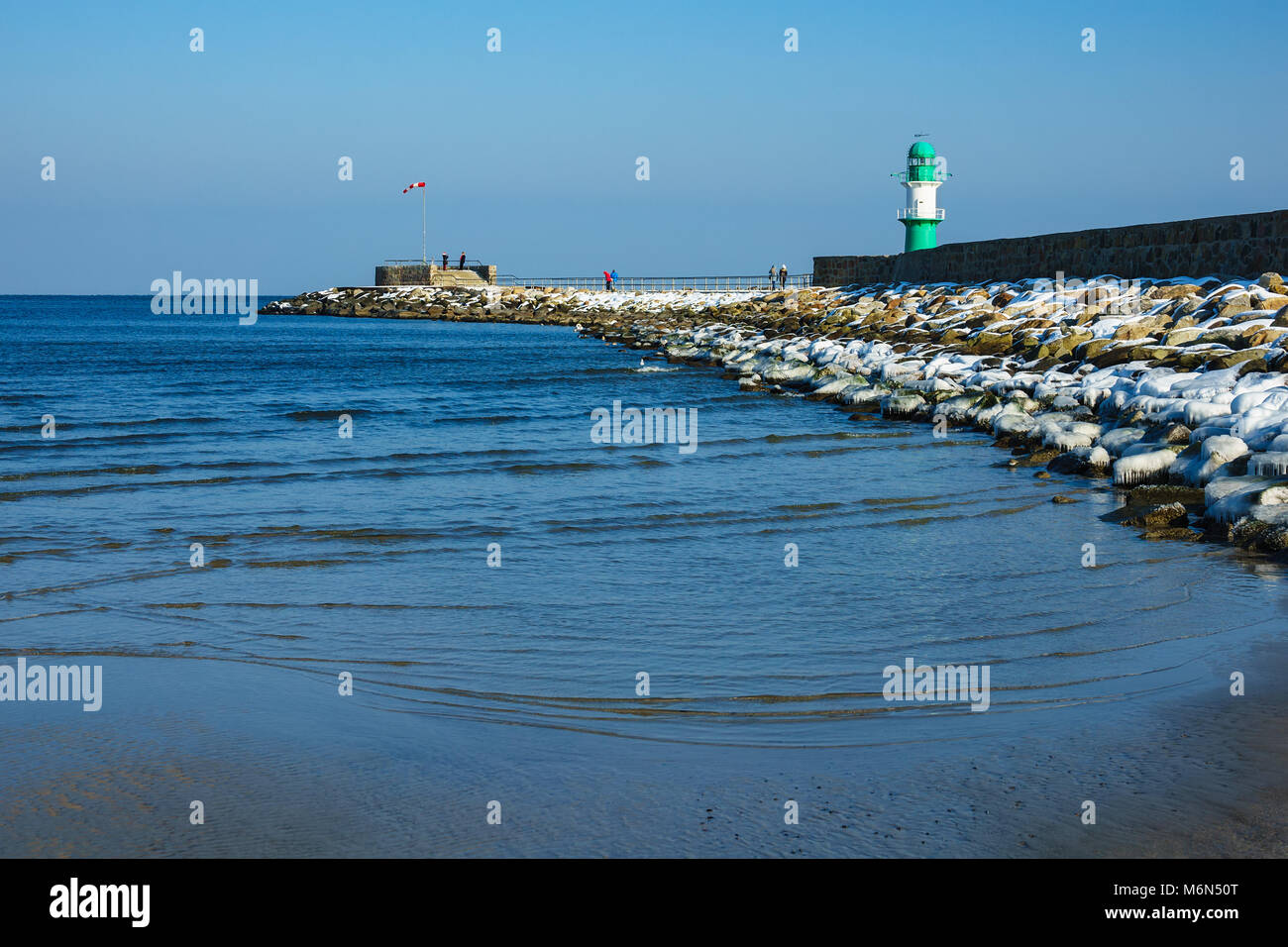 Mole in winter time in Warnemuende, Germany Stock Photo - Alamy