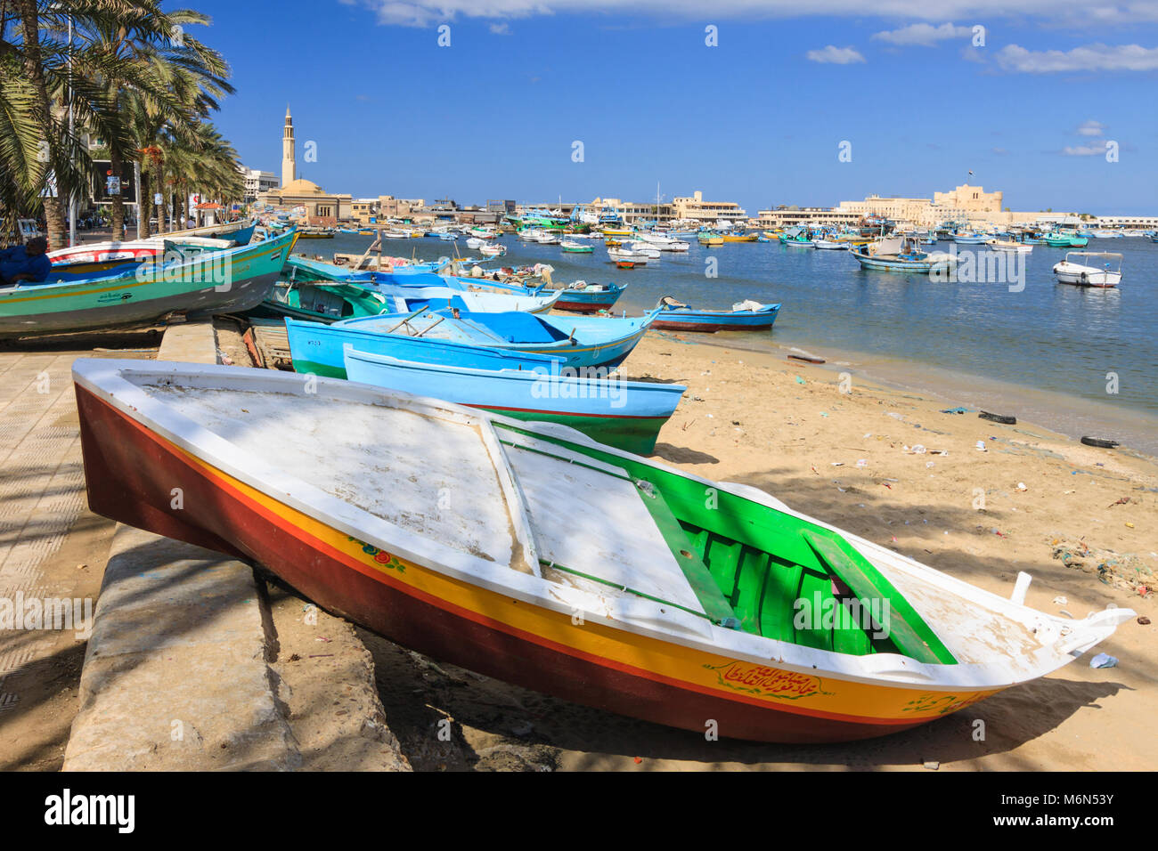 Colorful fishing boats at the beach in Alexandria Stock Photo - Alamy