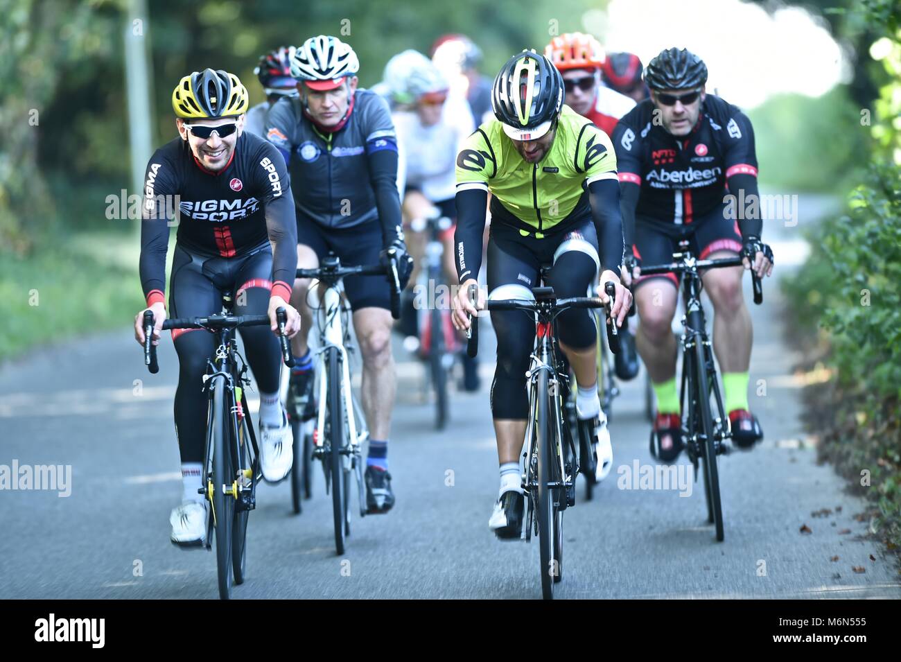 Marathon Bike ride, Multiple riders in countryside Stock Photo - Alamy