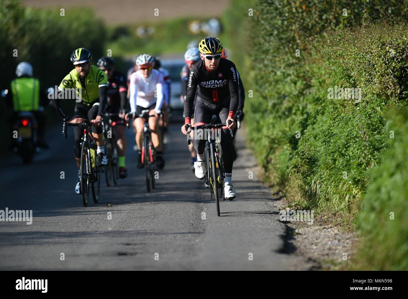 Marathon Bike ride, Multiple riders in countryside Stock Photo - Alamy