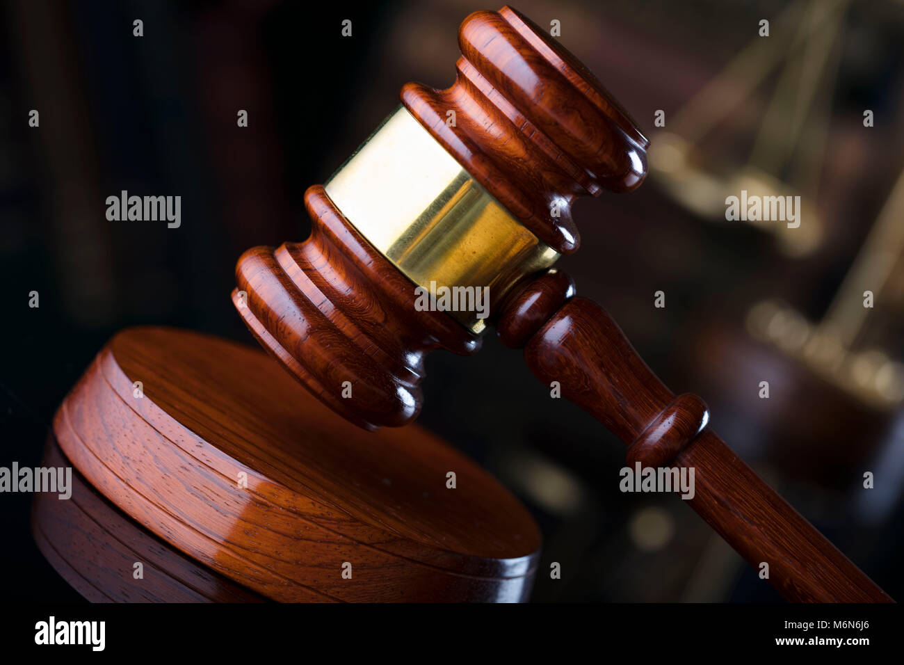 Law theme. Court library. Judge’s gavel on book background. Place for ...