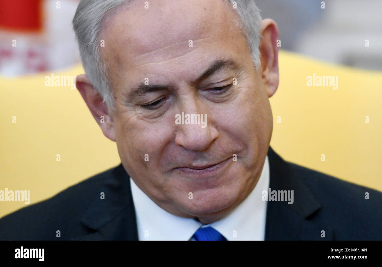 Prime Minister Benjamin Netanyahu of Israel looks on in the Oval Office ...