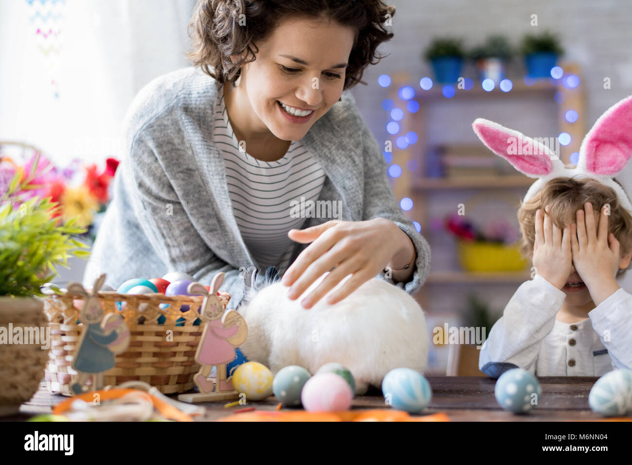 Happy Family Celebrating Easter Stock Photo - Alamy