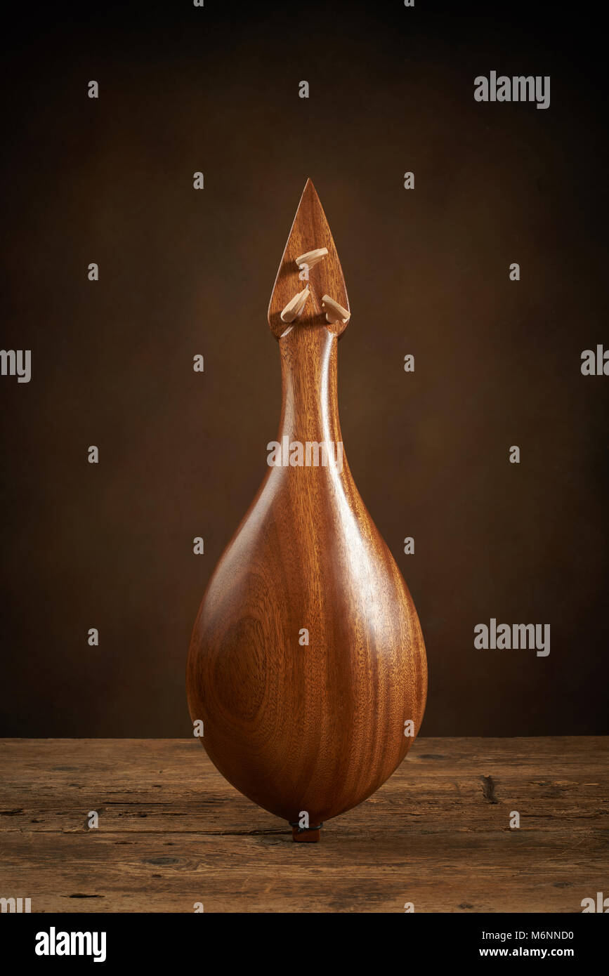 Traditional Greek instrument called Thrakian lyra on wooden background ...