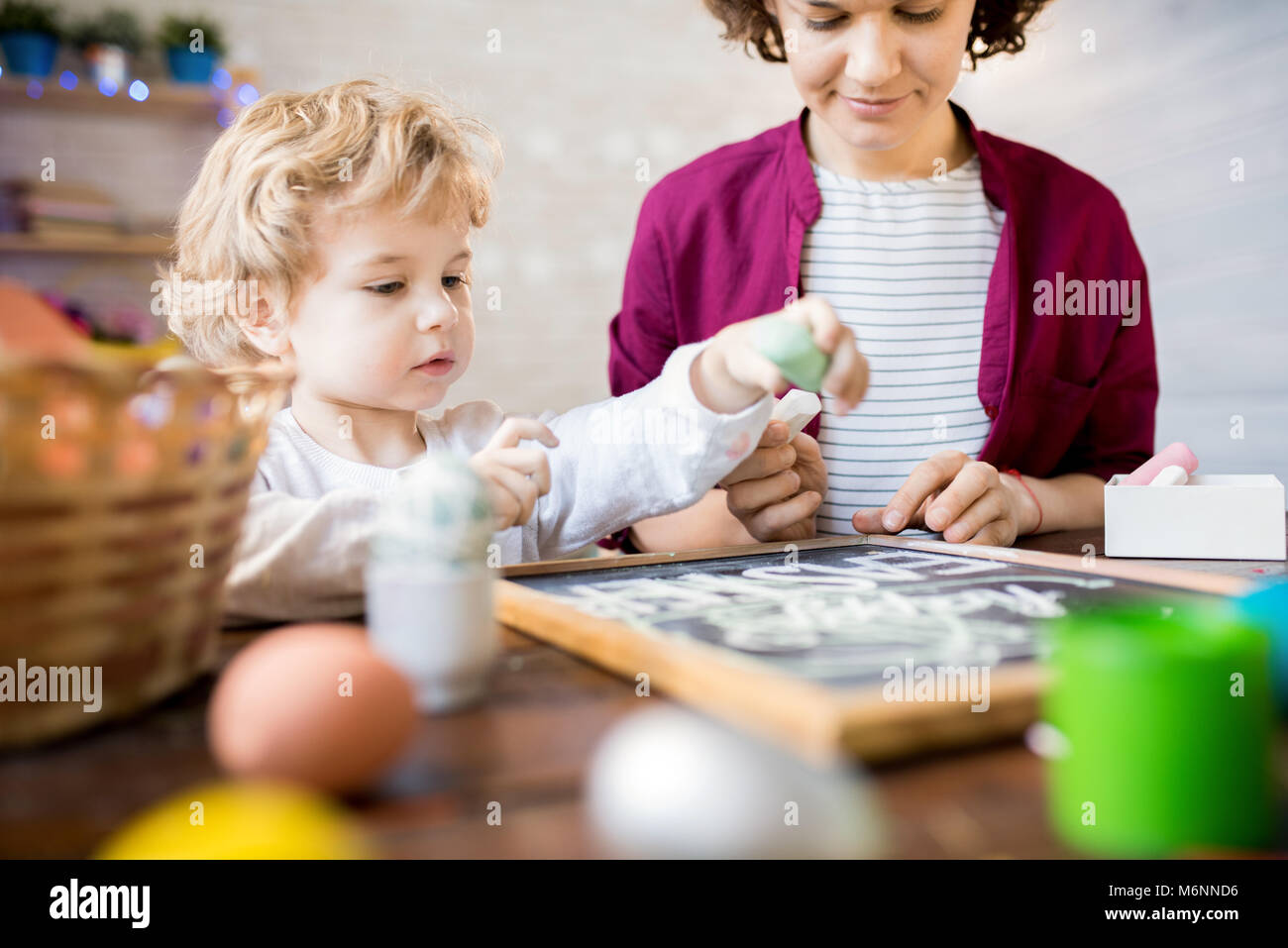 Little Boy Writing on Chalkboard Stock Photo - Alamy