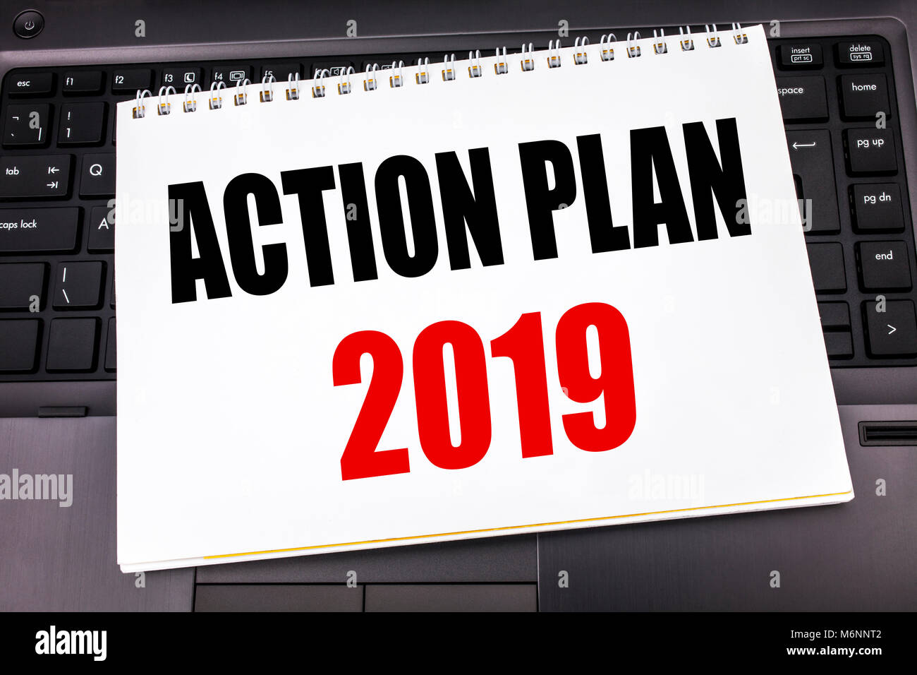 Handwritten text showing Action Plan 2019. Business concept writing for ...