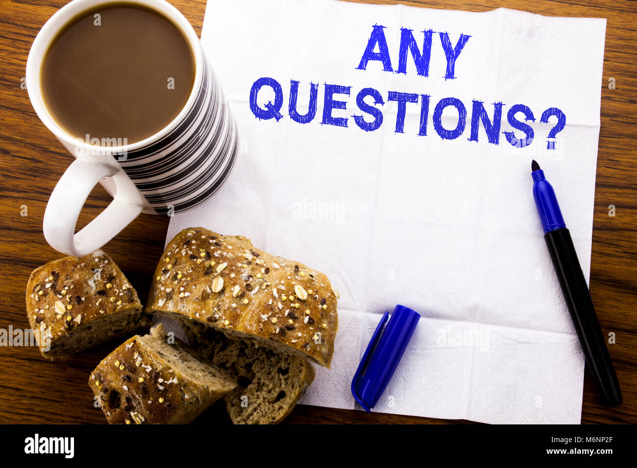 Handwritten text showing Any Questions. Business concept for Answer ...