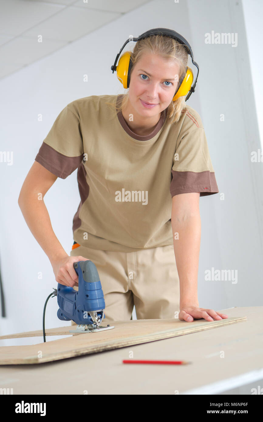 woman carpenter posing Stock Photo - Alamy