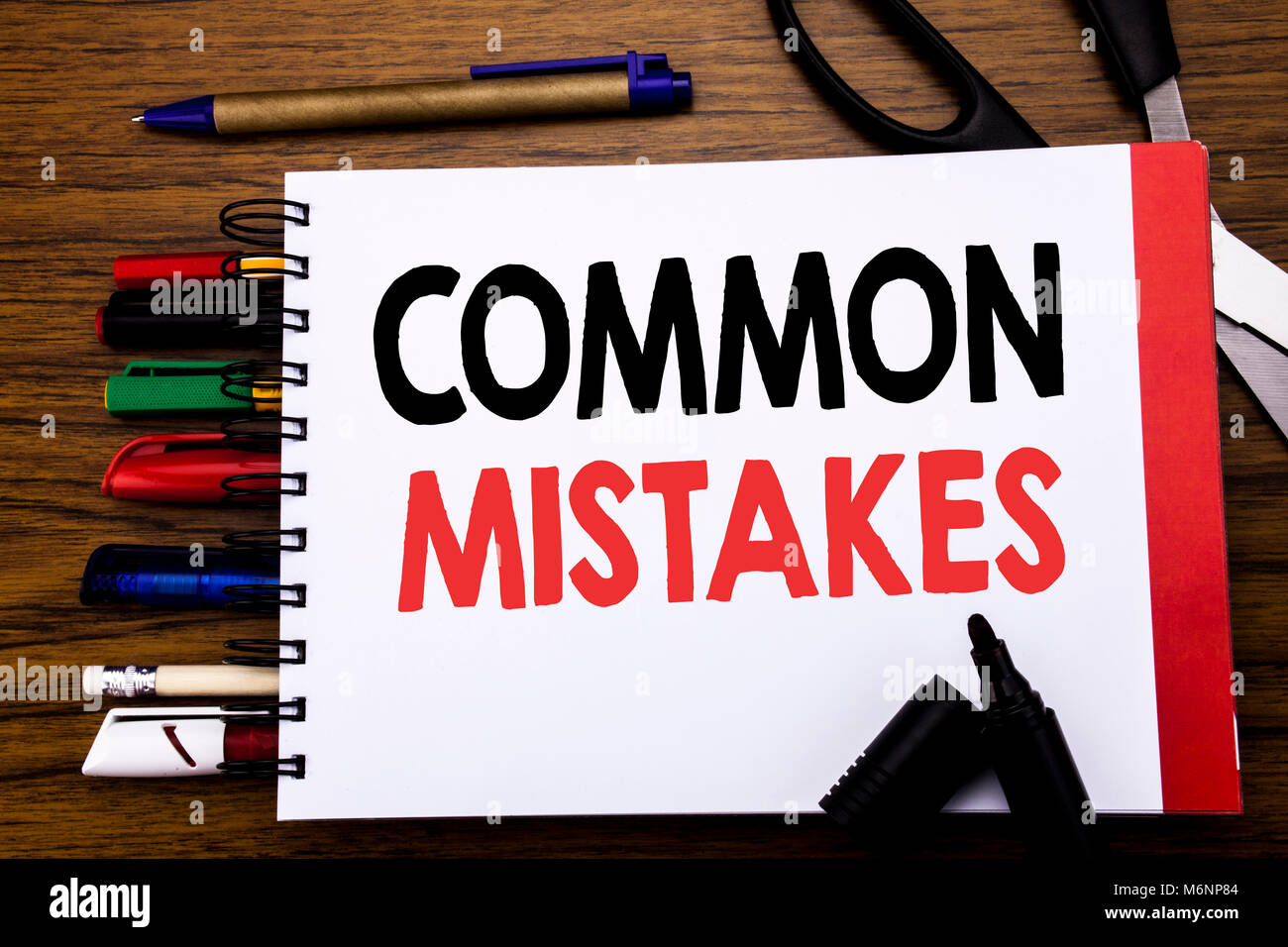 Handwritten text showing Common Mistakes. Business concept for Common ...