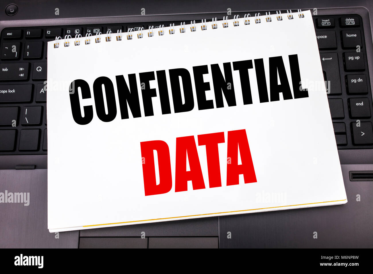 Handwritten text showing Confidential Data. Business concept writing ...