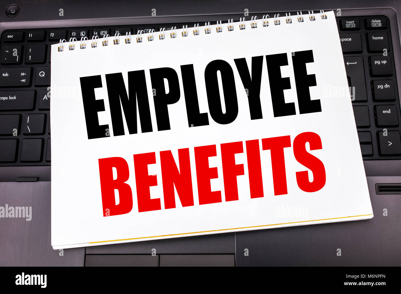 Handwritten text showing Employee Benefits. Business concept writing ...
