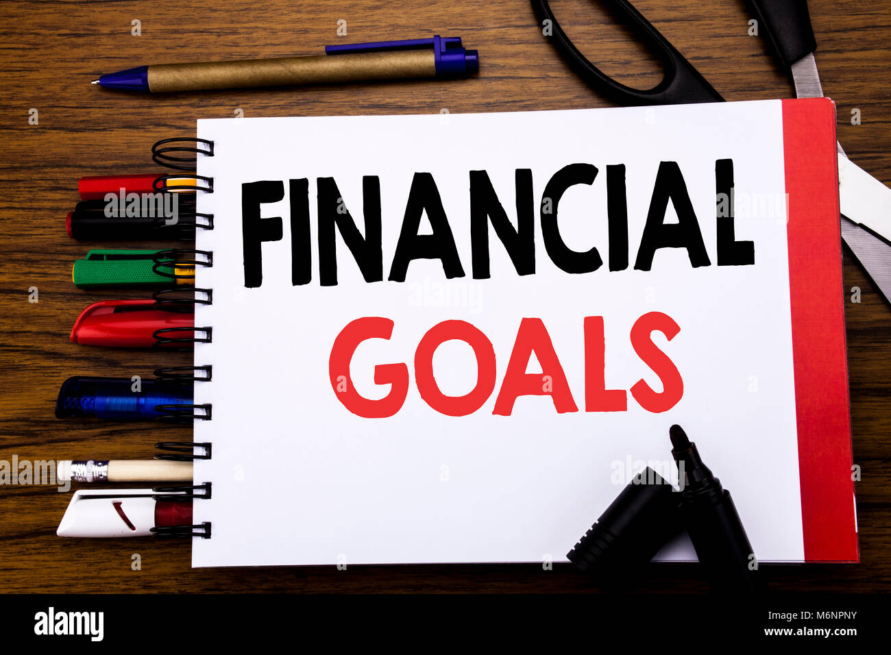 Handwritten text showing Financial Goals. Business concept for Income ...